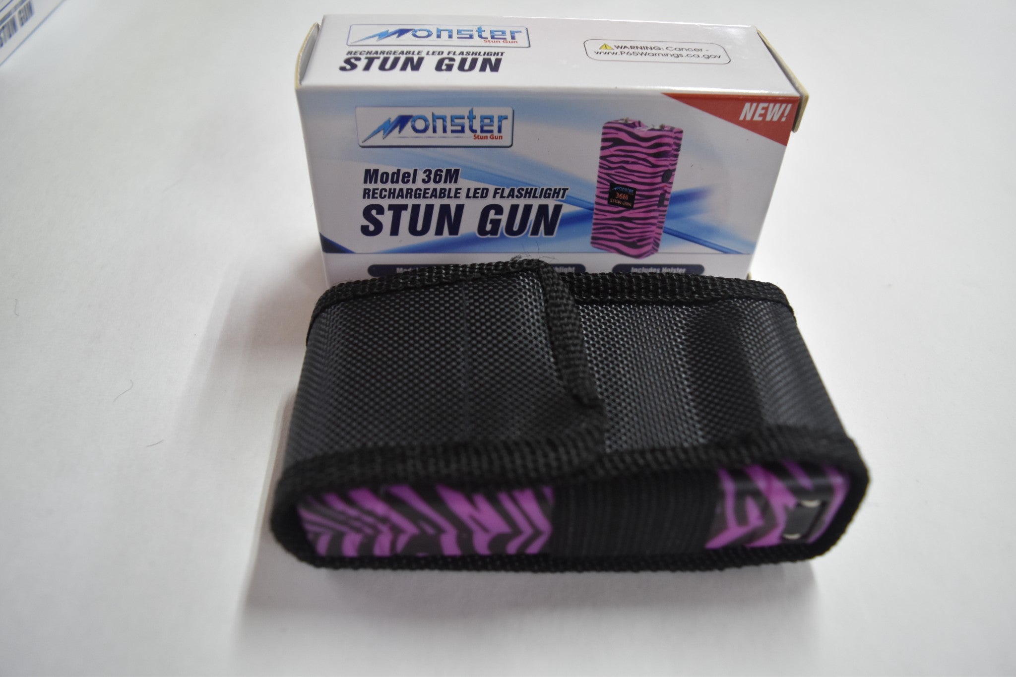 Monster Zebra High Voltage stun gun w/ flashlight Pink and Black Strip ...